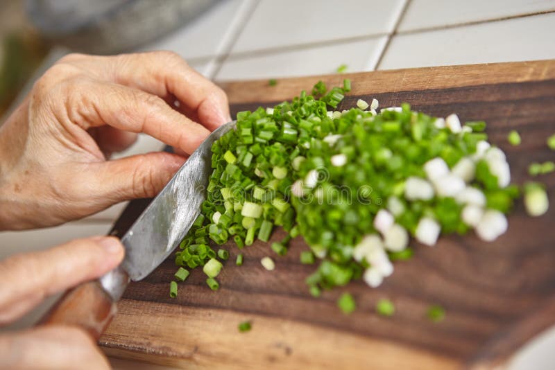 Cutting scallion stock image. Image of chinese, board - 49784129