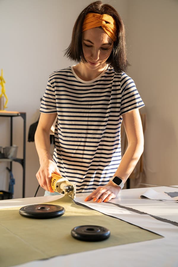 Cutting and Sewing in Tailor Studio: Sewer Young Woman Work with Fabric ...