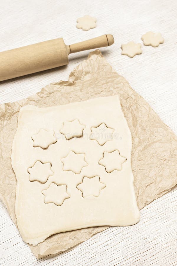 Cutting Shaped Cookies by Mold on Paper. Rolling Pin Stock Image ...
