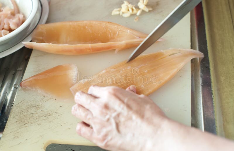 Cutting the Squid in the Kitchen Stock Photo - Image of squid, hands ...