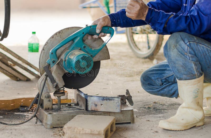 Cutting Steel with Machine for Cutting Steel by Worker Stock Image ...