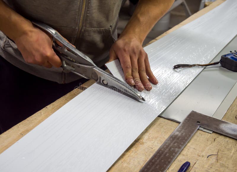 Cutting Strip Metal with Hand Shears Stock Photo - Image of cutter ...