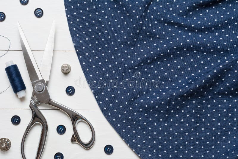 Cutting Textile or Fine Cloth with a Taylor Scissors on Wooden T Stock ...