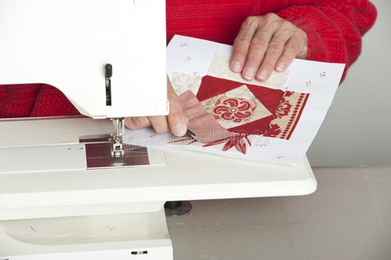 Quilter Cutting Thread on Sewing Machine. Stock Photo - Image of ...