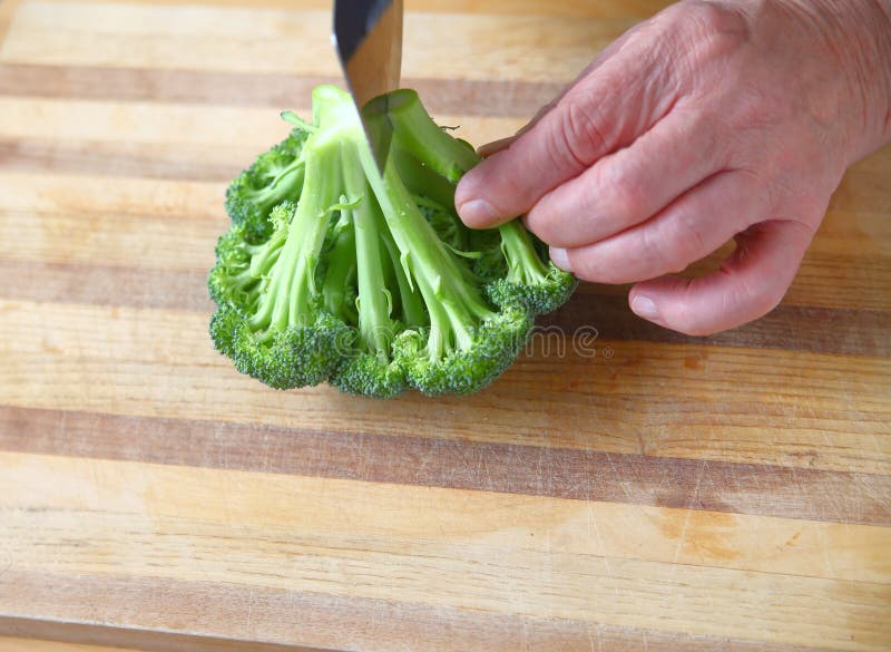 Cutting Up Broccoli on Wood Board Stock Image - Image of kitchen ...