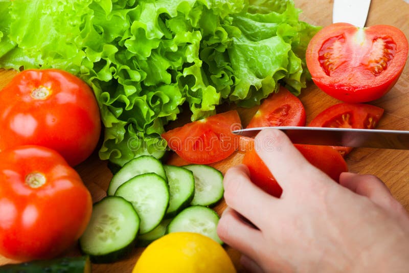 Cutting veggies stock photo. Image of potatoes, organic - 1949002