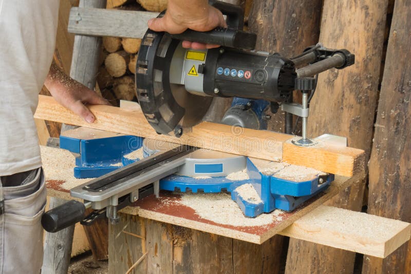 Cutting Wood with an Angle Saw Stock Photo - Image of control ...