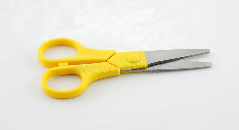 Cutting with Yellow Handled Scissors on White Background Studio Shot ...