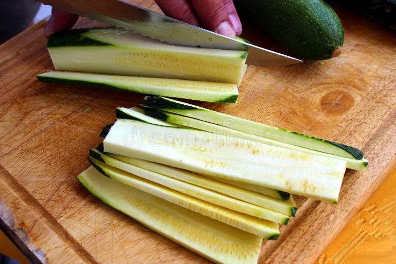 Cutting zucchini stock image. Image of sliced, cutting - 59493423