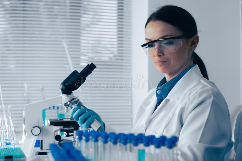 In a Cuttingedge Lab, a Dedicated Female Scientist Analyzes Samples ...