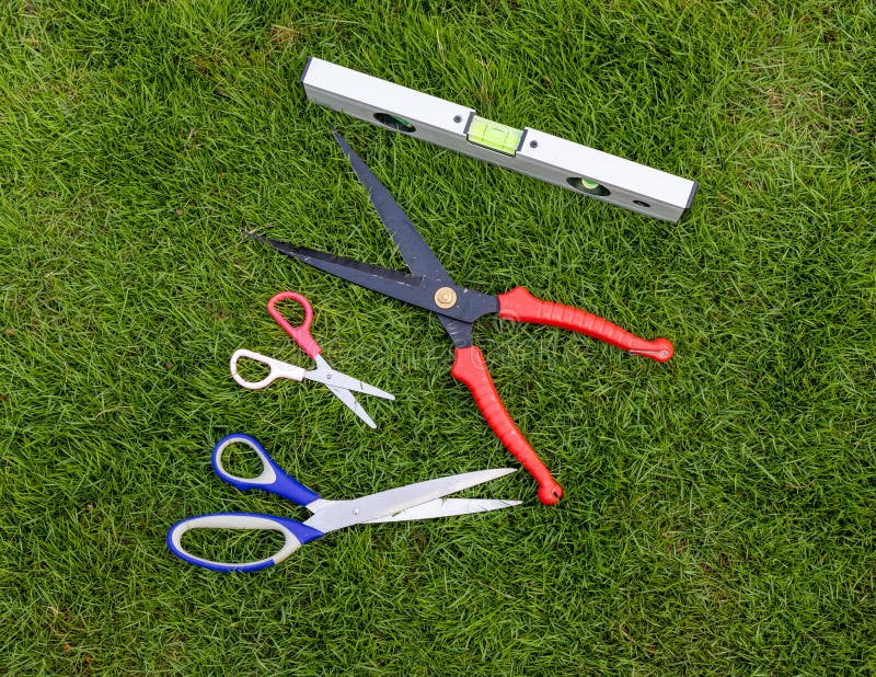 Cuttings Tools Laying in the Lawn Stock Image - Image of concept ...