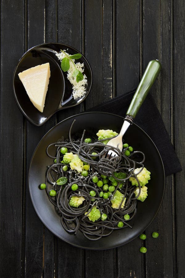 Cuttlefish Ink Spaghetti with Broccoli Stock Image - Image of green ...