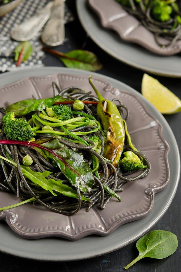 Cuttlefish ink spaghetti stock photo. Image of broccoli - 40245098