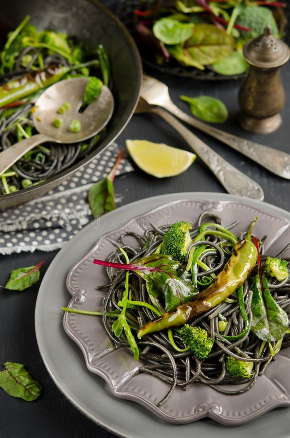 Cuttlefish ink spaghetti stock photo. Image of dark, broccoli - 40245116