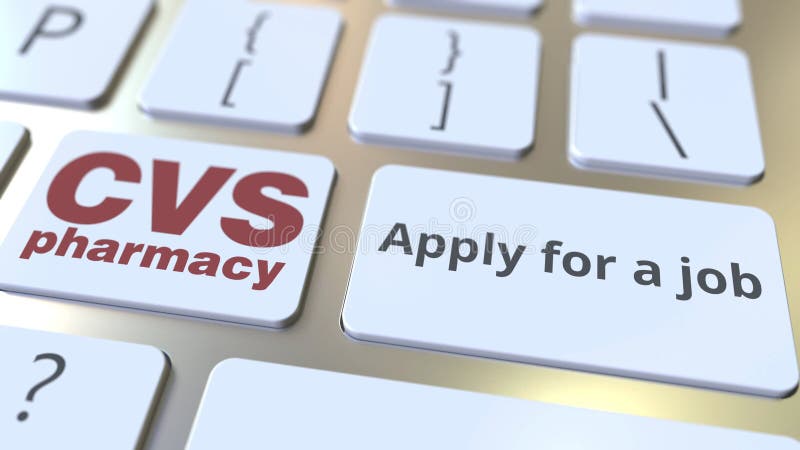 CVS PHARMACY Company Logo and Apply for a Job Text on the Keys of the ...