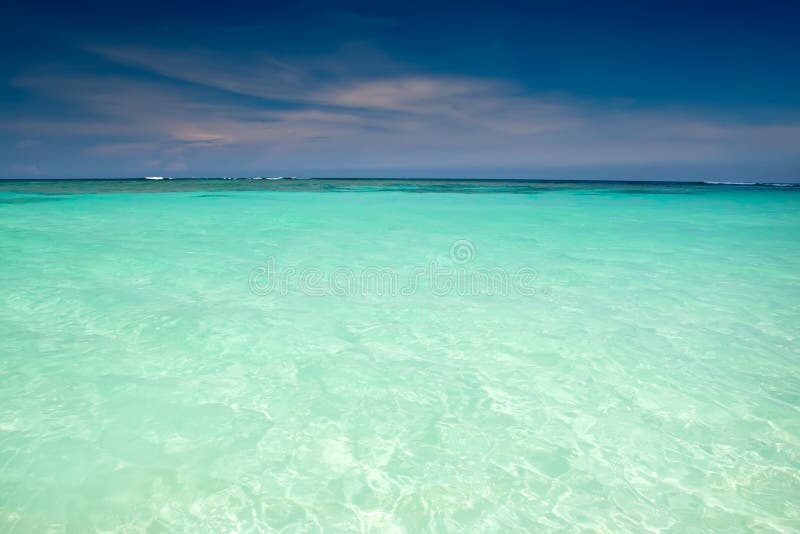 Cyan Ocean Under Blue Sky with Clouds Stock Photo - Image of blue ...