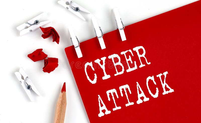CYBER ATTACK Text on the Red Paper with Office Tools on White ...