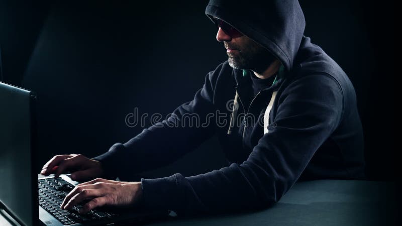 Cyber Crime, Hacker Man Typing on Laptop Computer Stock Footage - Video ...