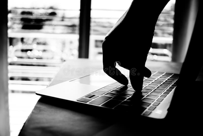 Cyber Crime Hand Reaching Out through Laptop Computer and Attack Stock ...