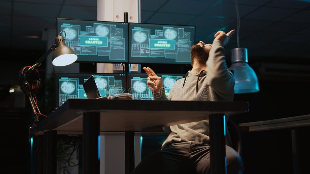 Cyber Scammer Feeling Happy about Hacking Security System Stock Photo ...