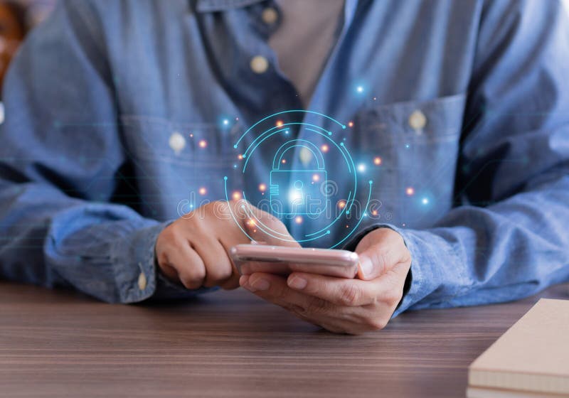 User is Using a Smartphone To Enter the Code To Unlock Access To ...