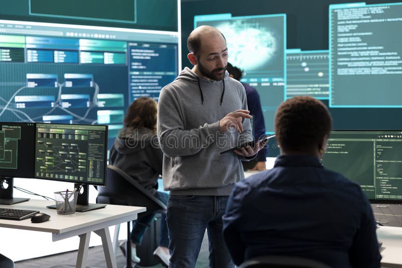 Cyber Security Team Conducting Cyber Surveillance in a Governmental ...