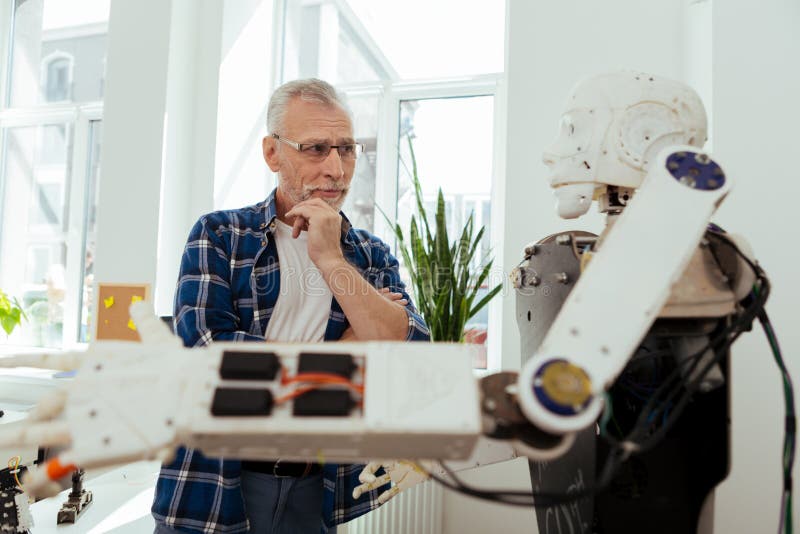 Smart Thoughtful Man Looking at the Robot Stock Image - Image of genius ...
