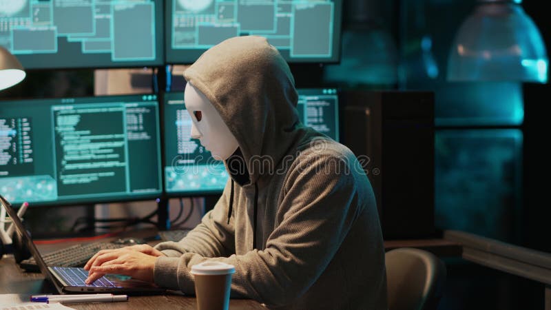 Cyber Terrorist with Mask Hacking Database Servers Stock Footage - Video of malware, crime ...