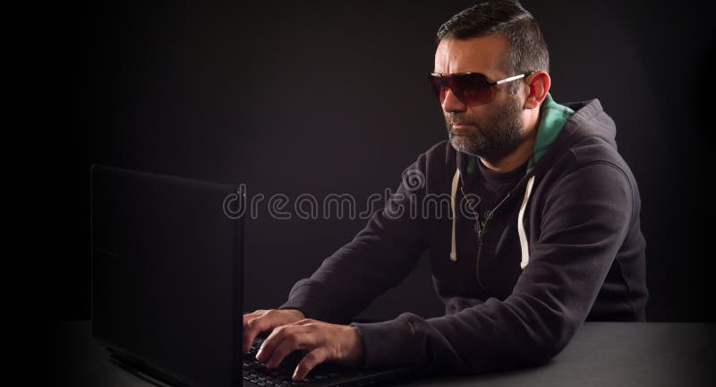 Cybercrime, Hacker Man Typing on Laptop Computer Stock Image - Image of ...