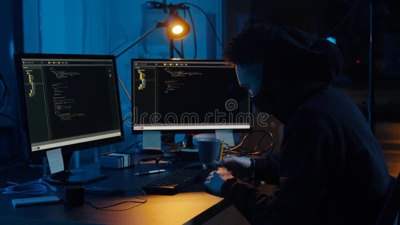 Hacker in Mask Using Computers for Cyber Attack Stock Footage - Video ...