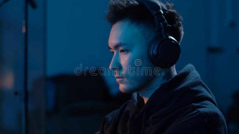 Hacker in Headphones Using Computer at Nigt Stock Footage - Video of ...