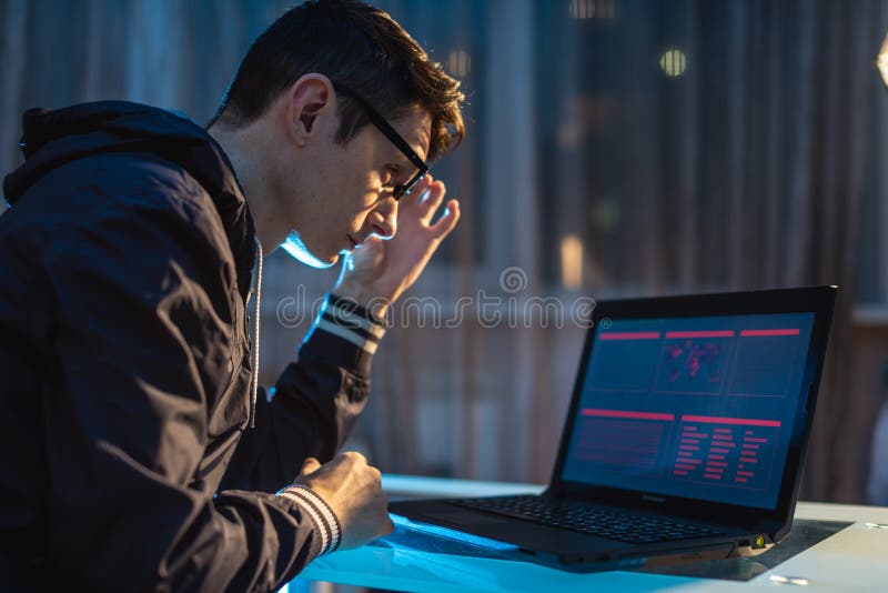 Cybercriminal Hacker Typing Program Code While Stealing Access Databases With Passwords Concept