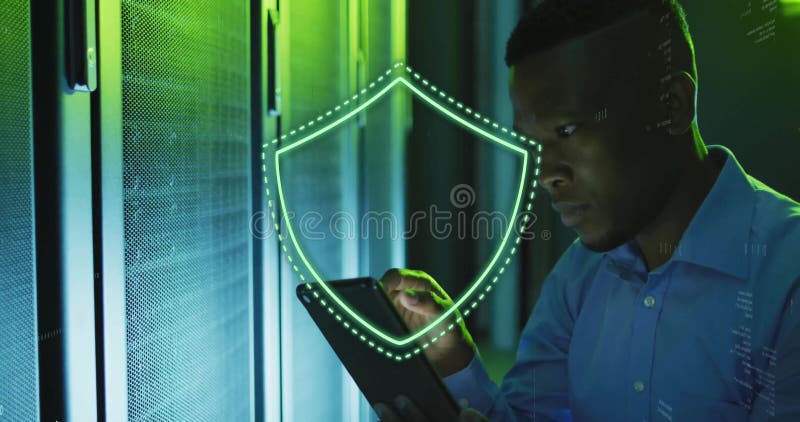 Cybersecurity Shield Animation Over Man Using Tablet in Server Room ...