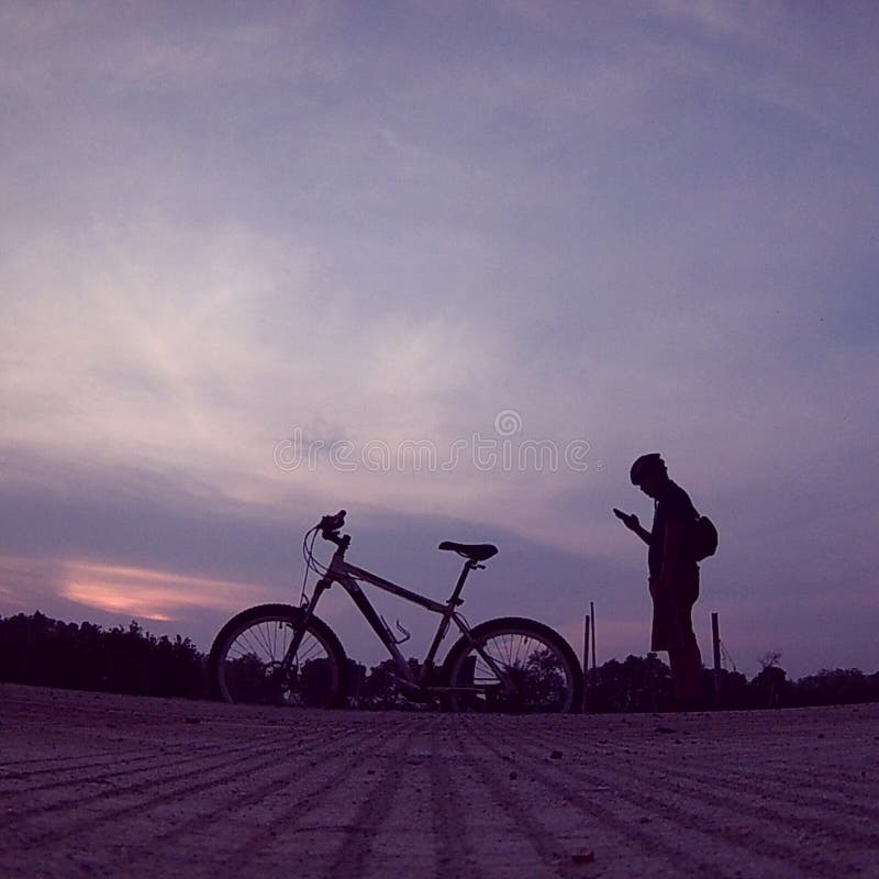 Cycle man sunsets stock photo. Image of shilluete, cycle - 152081438