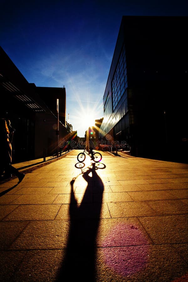 Cycle Shadow stock photo. Image of dramatic, bricks, town - 6964258