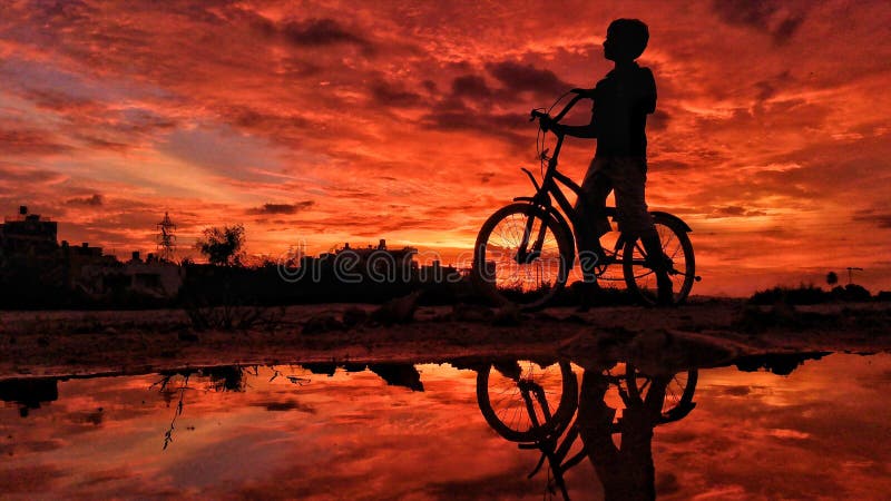Cycle and the sunset stock image. Image of riding, ground - 129260543