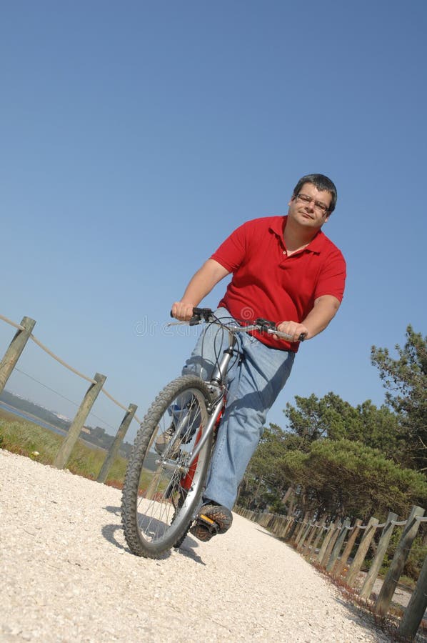 Cycler On The Seaside Walking With Bike Picture. Image: 14623663