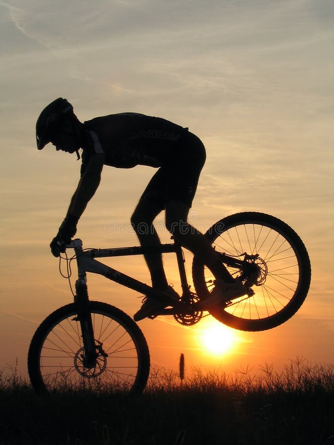 Cycling stock image. Image of orange, blue, field, lifestyle - 704245