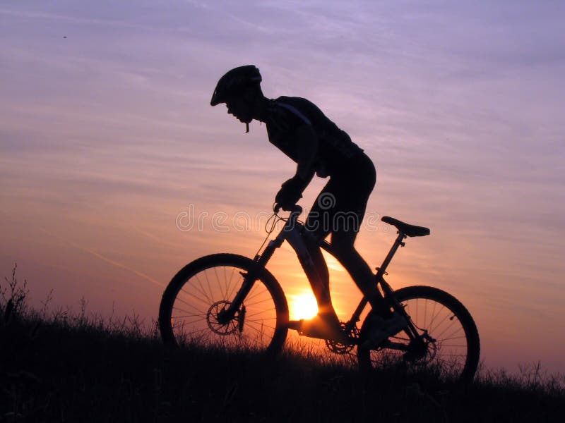 Cycling stock image. Image of orange, blue, field, lifestyle - 704245