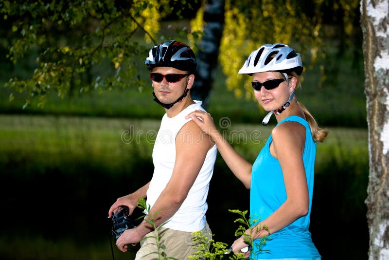 Cycling couple stock image. Image of bike, activity, nature - 10619341