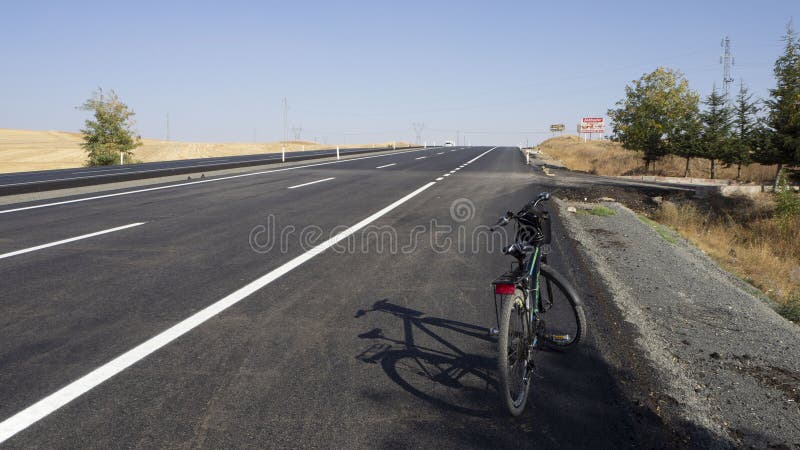 Cycling on the Newly Built Asphalt Road, Cycling on the Highway Stock ...