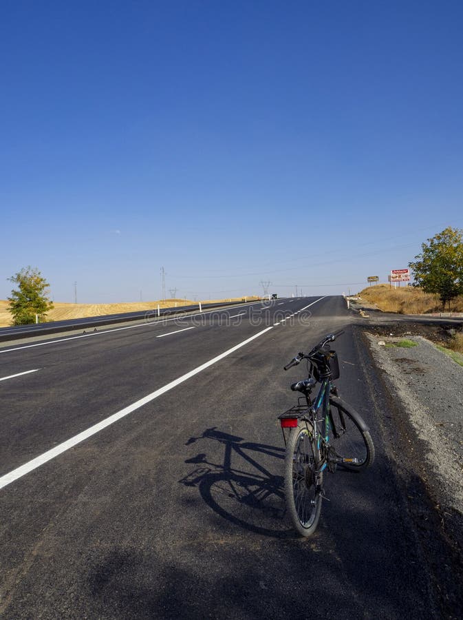 Cycling on the Newly Built Asphalt Road, Cycling on the Highway Stock ...