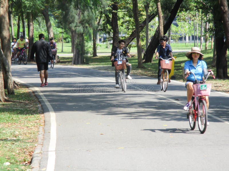 Cycling in the park editorial photo. Image of park, road - 61471086