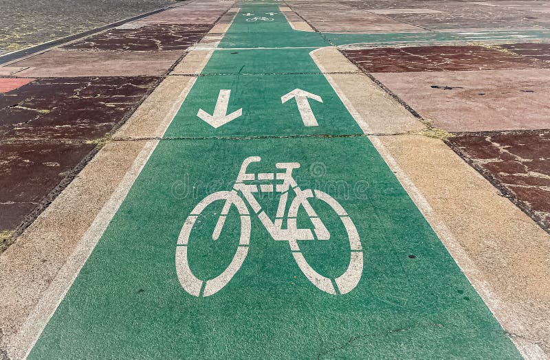 Cycling Path with a Bicycle and Arrows Drawing Sign on it. Stock Image ...