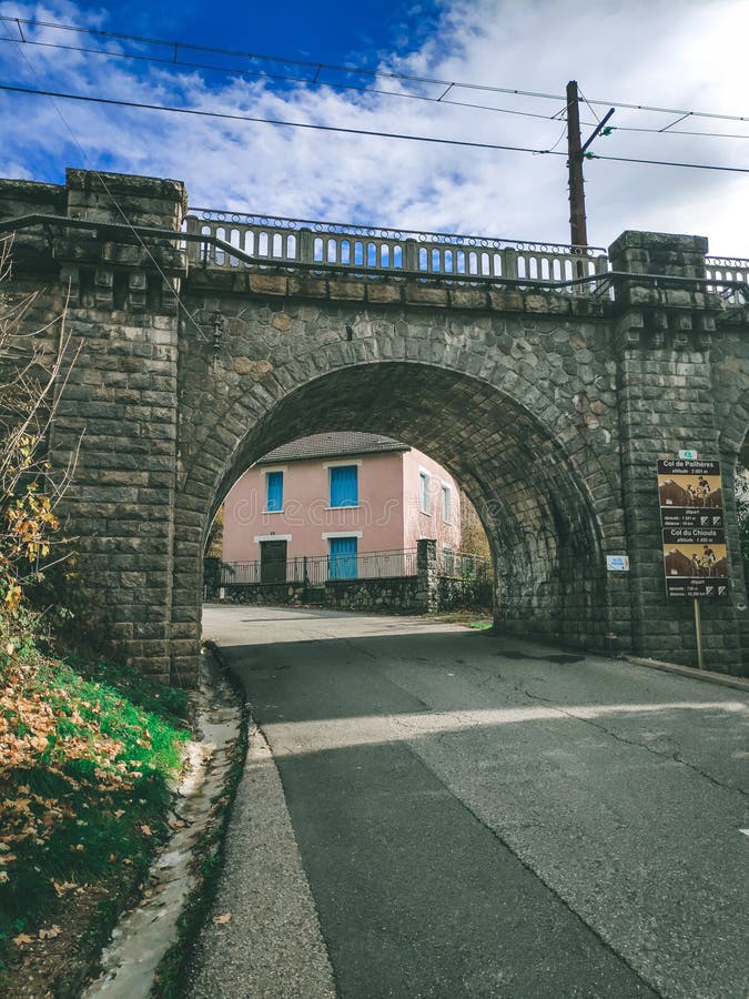 Cycling Trail Going Under an Ancient Stone Bridge. Stock Image - Image ...