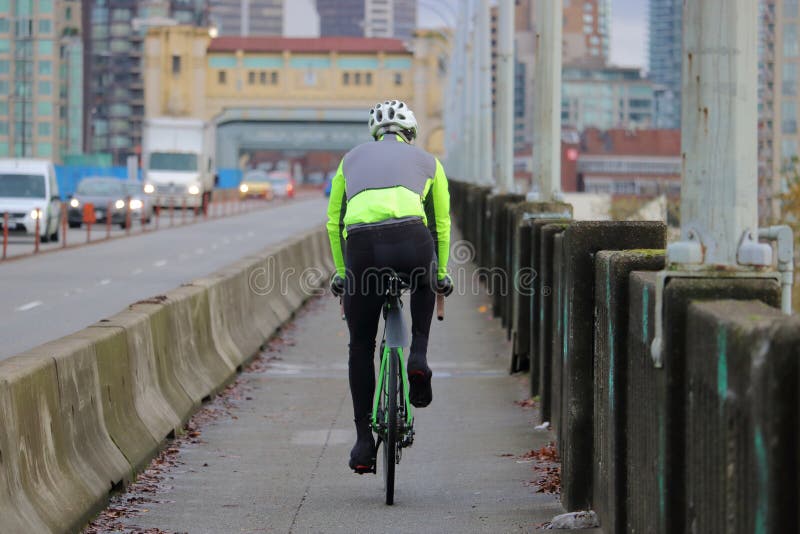 Cyclist Commuting in the City Stock Photo - Image of alternative, adult ...