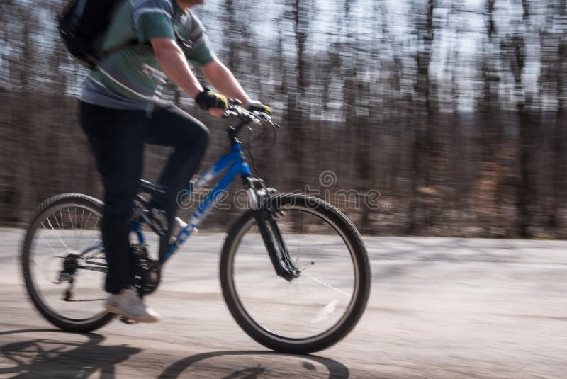 Cyclist in Motion stock image. Image of blue, blurred - 2285755