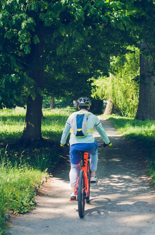 The Cyclist in Motion Riding Bicycle Road Stock Photo - Image of ...