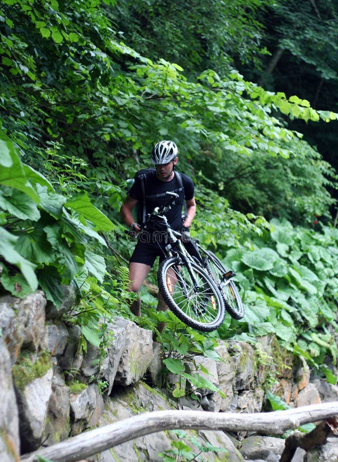 Cyclist in the mountains stock photo. Image of nature - 65852574