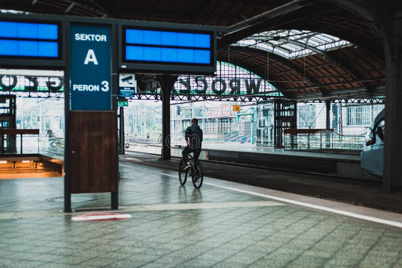 Cyclist at the Platform of Train Station Stock Photo - Image of person ...